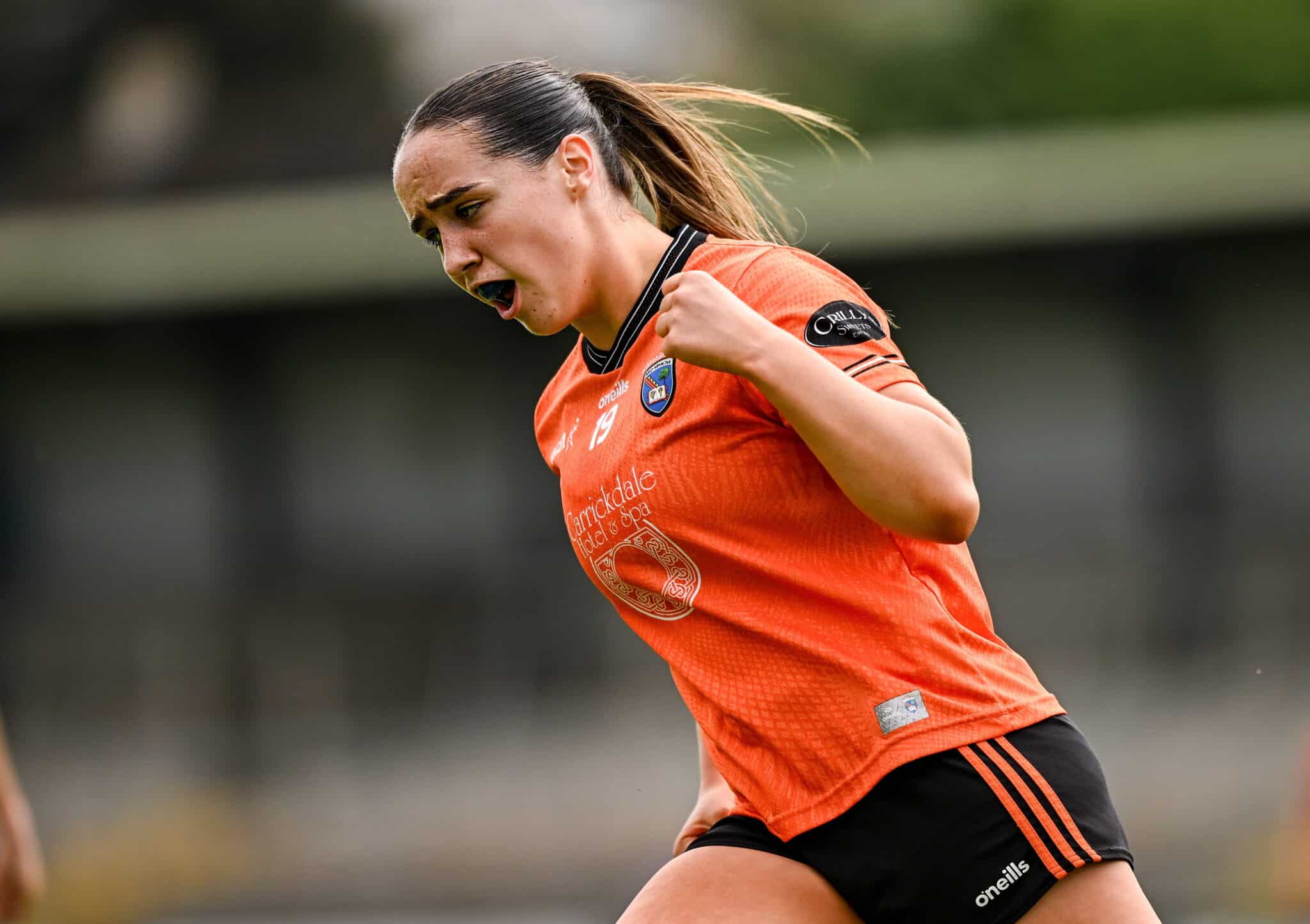Armagh held off a late Waterford rally to book a home quarter-final ...